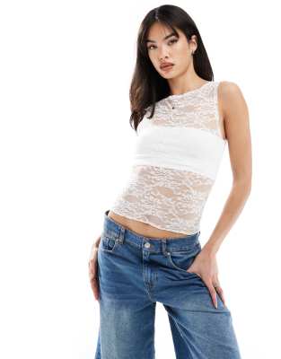 ASOS DESIGN - Top sans manches en dentelle à encolure bateau - Ivoire | ASOS