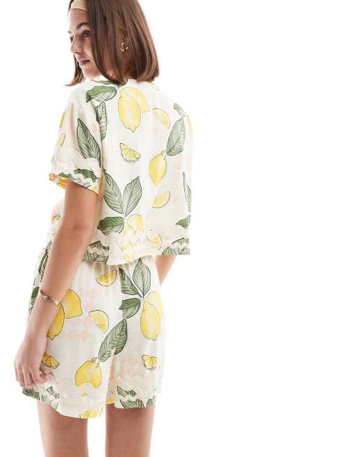 ASOS DESIGN top with tie front and rik rak trim in lemon print | ASOS