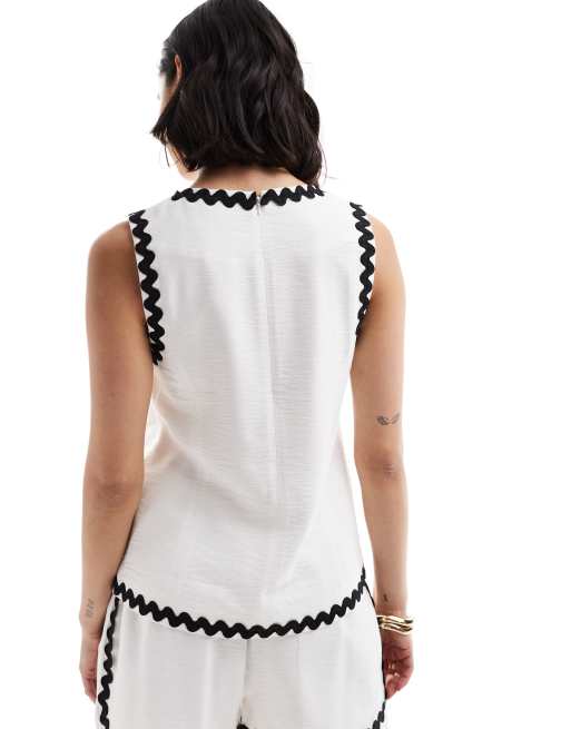 ASOS DESIGN top with wrap front and rik rak trim in mono - part of a ...