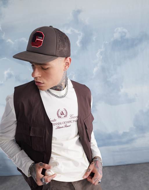 ASOS DESIGN trucker cap with textured letter badge in brown | ASOS