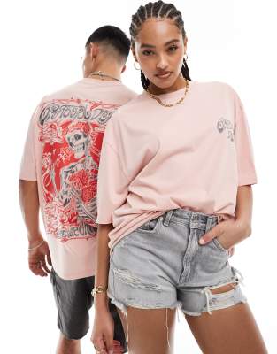 ASOS DESIGN unisex oversized license band tee in washed pink with ...