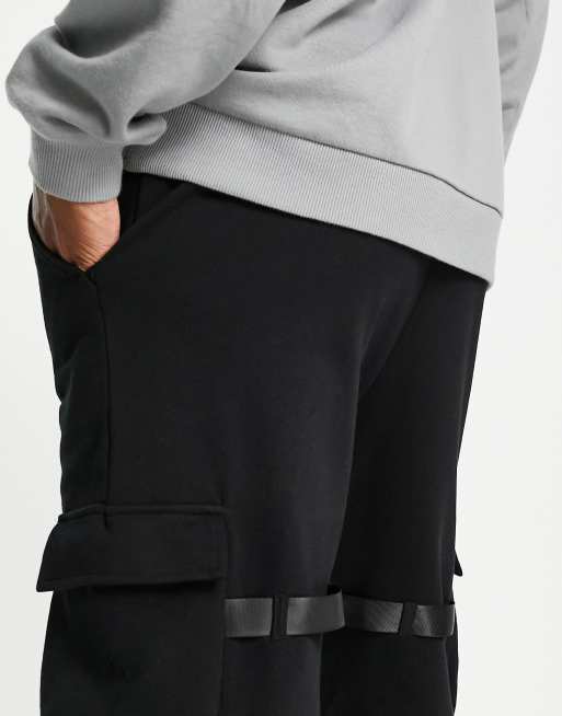 ASOS DESIGN utility cargo trackies with multi pockets & strapping | ASOS