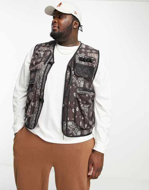 ASOS DESIGN utility vest in black paisley print with pockets | ASOS