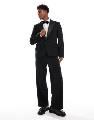 ASOS DESIGN – Weit geschnittene Smoking-Hose in Schwarz mit Kummerbund ...