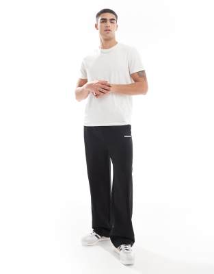ASOS DESIGN wide leg trackies with tech zip and print in black | ASOS