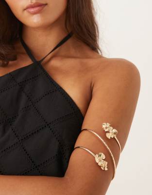 ASOS DESIGN wrap around arm cuff with flower detail in gold tone | ASOS