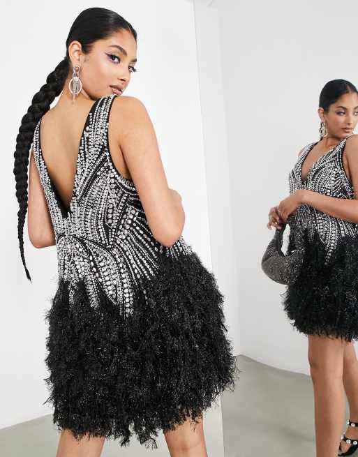 ASOS EDITION - Robe courte ornée de perles et de cristaux avec ourlet à plumes synthétiques ...