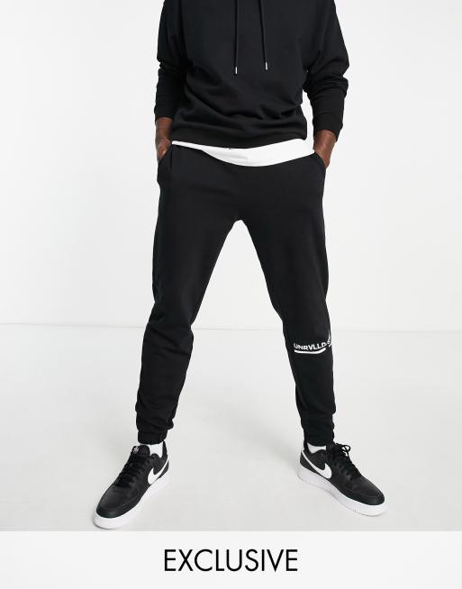 Asos Unrvlld Spply Co Ord Tapered Trackies With Logo Print In Black Asos