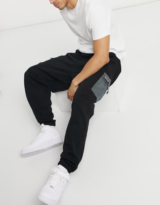 Asos Unrvlld Spply Oversized Sweatpants With Nylon Pockets And