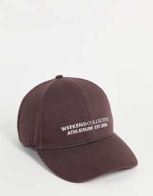 ASOS Weekend Collective baseball cap with logo in brown | ASOS