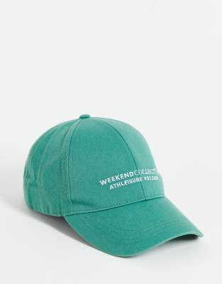 ASOS Weekend Collective baseball cap with logo in green | ASOS