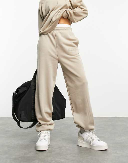 ASOS Weekend Collective jogger in washed neutral with wca logo | ASOS