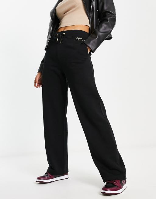 Barbour International Parallel wide leg trackies in black | ASOS
