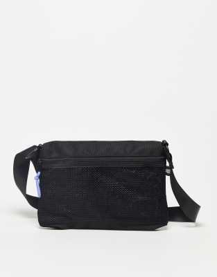 Basic Pleasure Mode pouch cross body bag in black mesh with power cords | ASOS