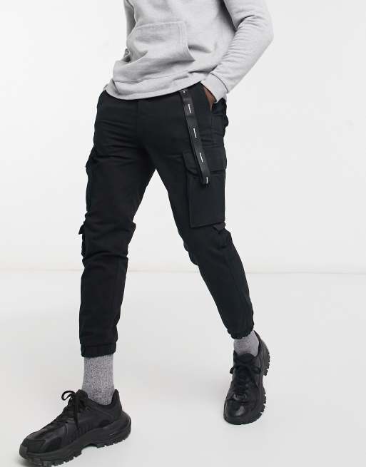Bershka cargo pants with key chain in black | ASOS