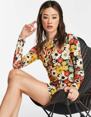Bershka cross strap detail long sleeve mini dress in bold retro floral ...