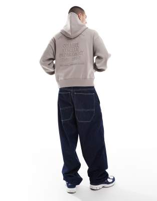 Bershka hoodie with emboss print in beige | ASOS