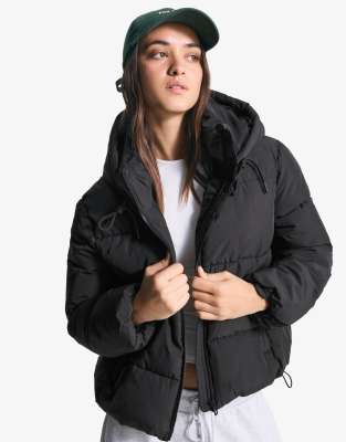 Bershka Puffer jacket with hood in black | ASOS