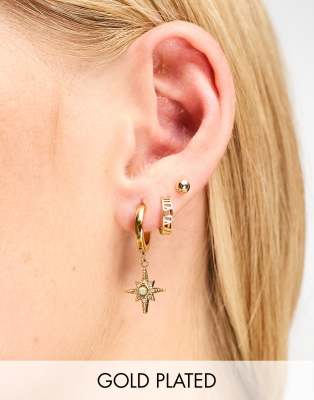 Bohomoon Dolly gold plated huggy earrings with opal star charm | ASOS