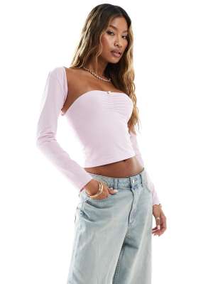 Bolero rosa claro ceñido con diseño de doble capa exclusivo de Kaiia ...