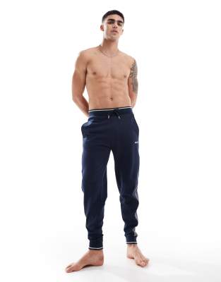 BOSS Bodywear logo trackies in navy | ASOS