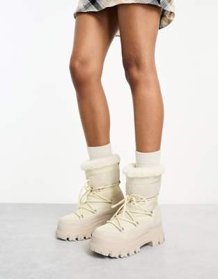 Buffalo vegan-friendly snow boots in cream | ASOS