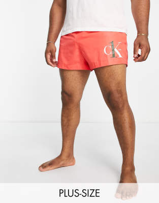 Calvin Klein Big & Tall CK One polyester swim shorts in red | ASOS
