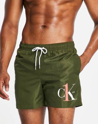 Calvin Klein CK One swim shorts in khaki | ASOS