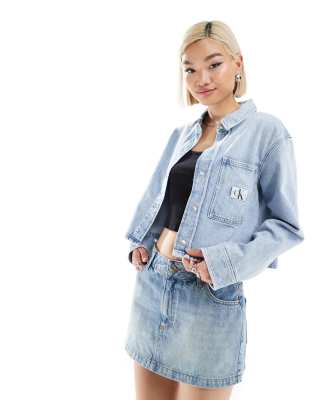 Calvin Klein Jeans boxy denim shirt jacket in light wash | ASOS