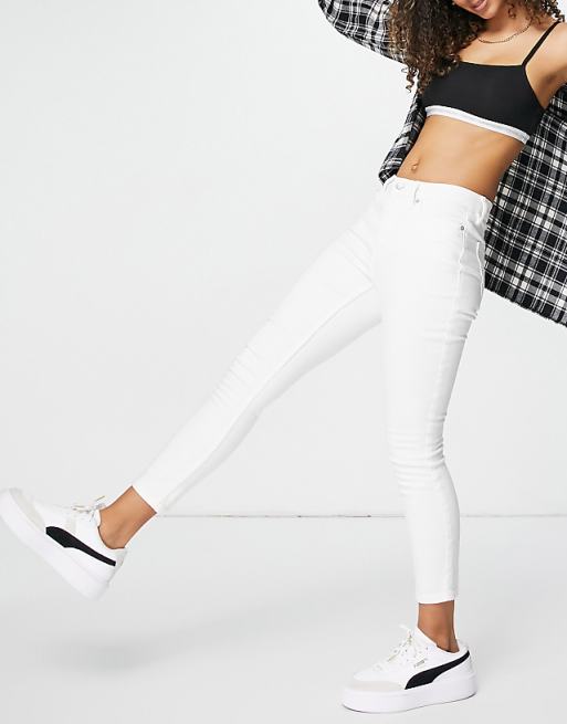 Calvin Klein Jeans high rise cropped skinny jean in white | ASOS Calvin Klein Jeans high rise cropped skinny jean in white | ASOS