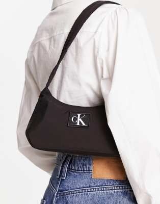 Calvin Klein Jeans monogram logo shoulder bag in black | ASOS