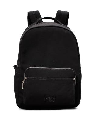 Calvin Klein Jeans Round Backpack in Black | ASOS