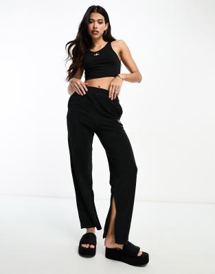 Calvin Klein monogram beachwear high waist trouser in black | ASOS