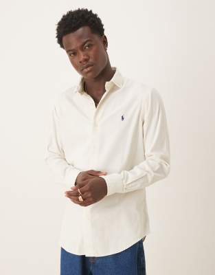 Camisa color crema de manga larga con logo de icono de Polo Ralph ...