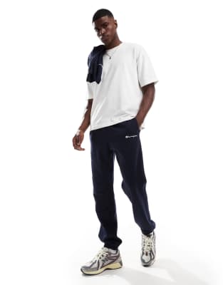 Champion Legacy cuffed trackies in navy | ASOS