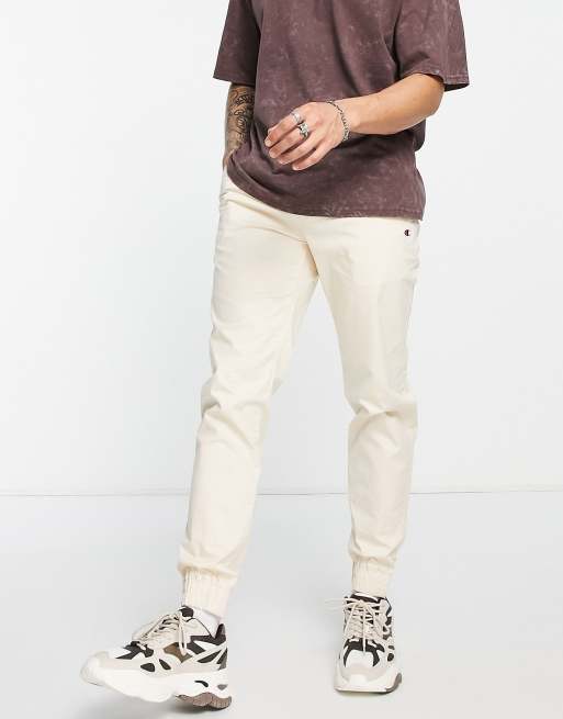 Champion oversized trackies with small logo in tan | ASOS