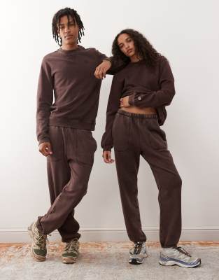 Champion unisex elastic cuff trackies in brown | ASOS