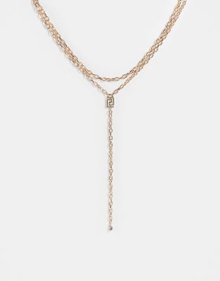 Collar dorado con detalle de greca griega de River Island | ASOS