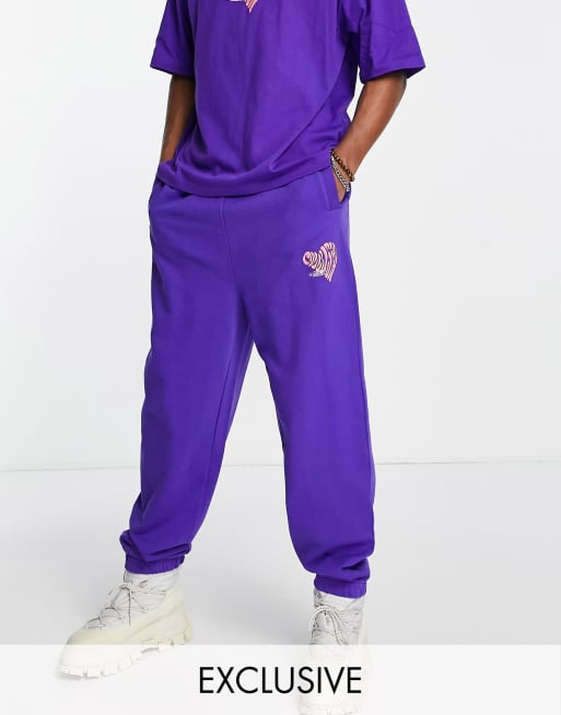 COLLUSION oversized trackies with logo heart print in purple acid wash | ASOS