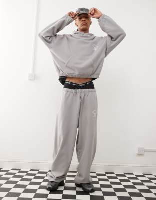 COLLUSION relaxed baggy trackies with print in grey | ASOS