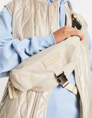 Consigned nylon clip bum bag in off white | ASOS