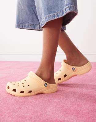 Crocs Classic clog in peach | ASOS