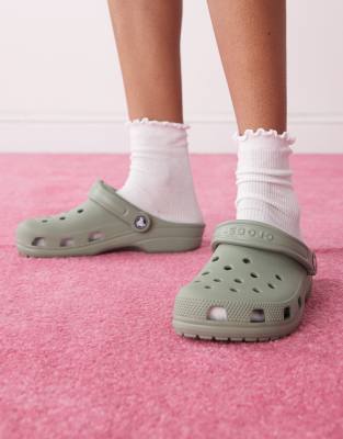 Crocs Classic clogs in moss | ASOS