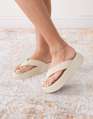 Crocs Getaway platform flip in white | ASOS