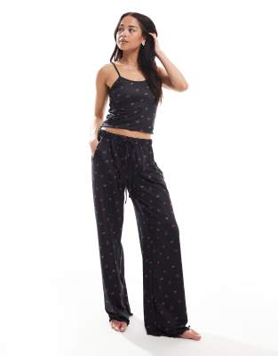 Daisy Street red ditsy floral pyjama bottoms in black | ASOS