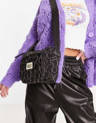 Damson Madder polyester cross body bag in padded floral print | ASOS