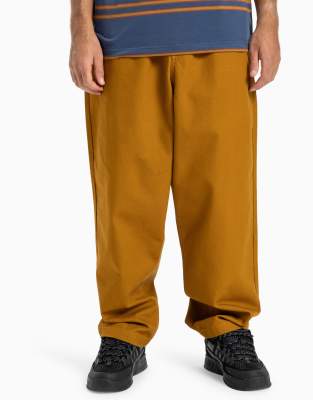 DC Shoes Framed elasticated waist trousers in golden brown | ASOS