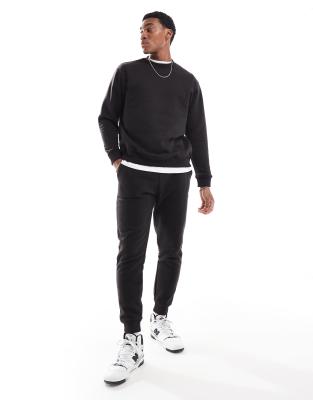 DTT crew neck sweatshirt & jogger tracksuit set in black | ASOS