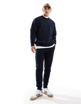 DTT crew neck sweatshirt & jogger tracksuit set in dark navy | ASOS