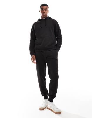 DTT overhead hoodie & trackies tracksuit set in black | ASOS